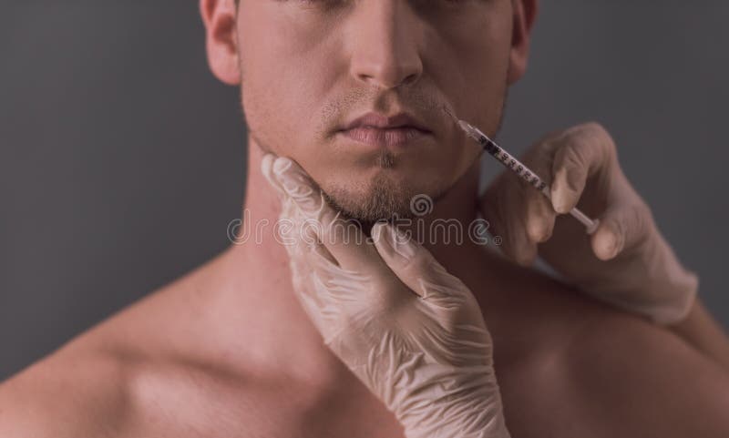 Man getting injection stock image. Image of doctor, cropped - 118097273