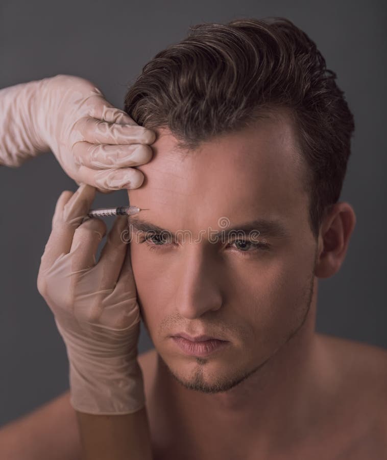 Man getting injection stock image. Image of operation - 118097243