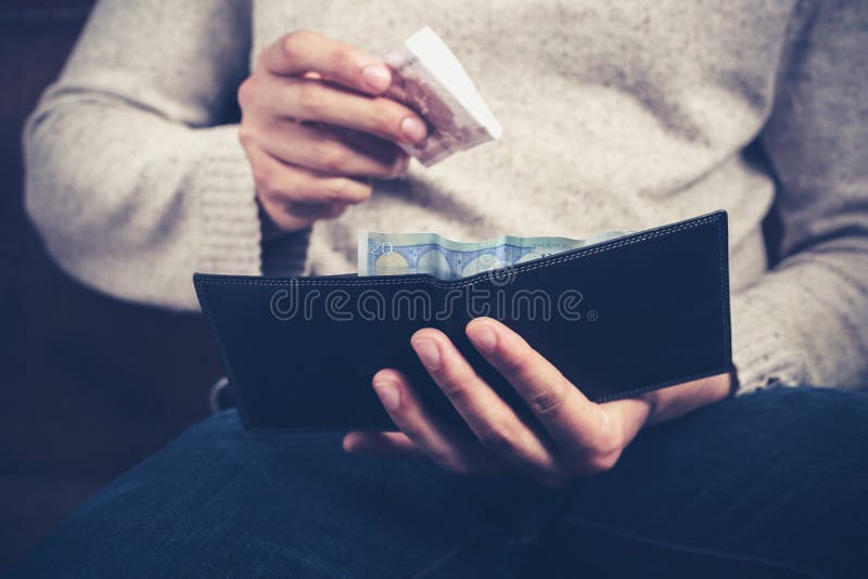 Man Getting Money Out of His Wallet Stock Image - Image of shopping ...