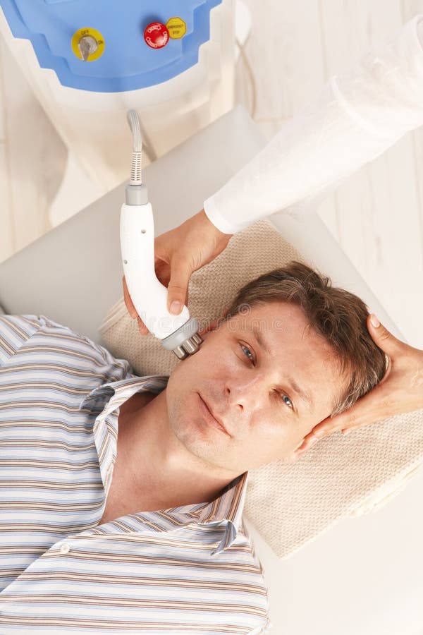 Man Getting Radio Frequency Treatment Stock Image - Image of fourties ...