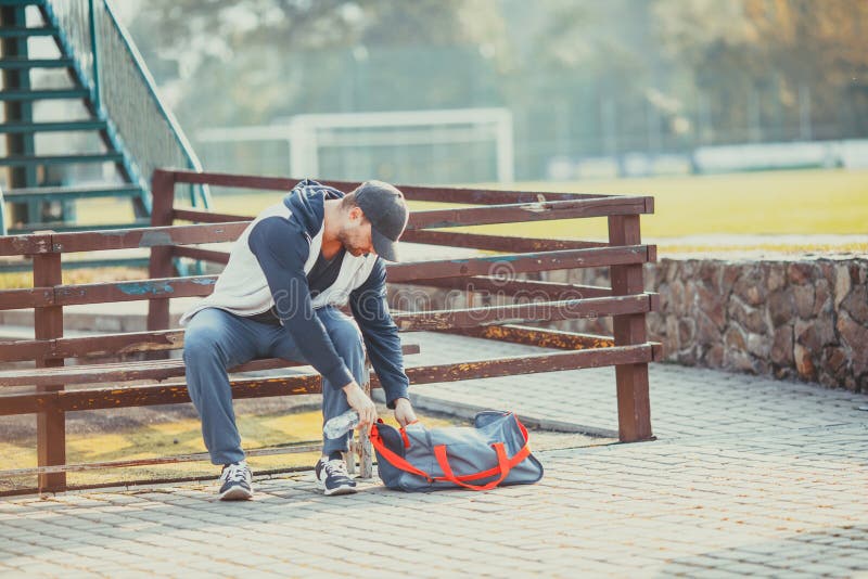 A Man is Getting Ready To Workout Stock Photo - Image of runner, active ...