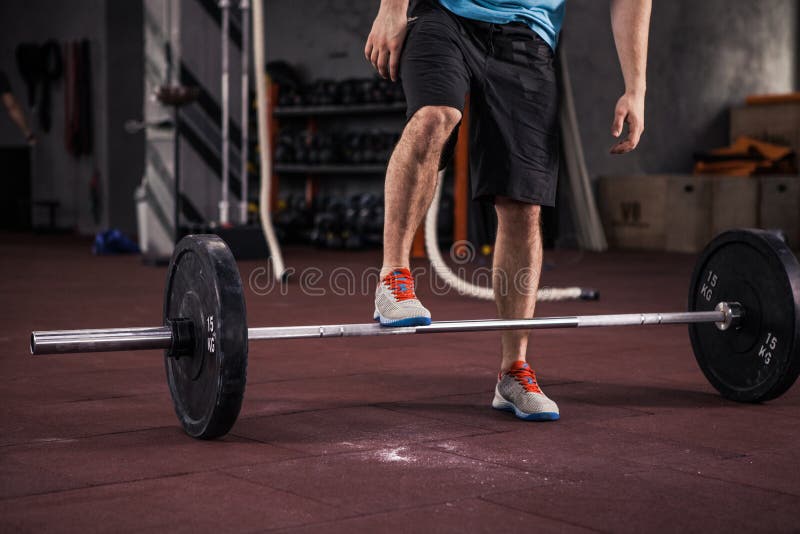Young man at a gym stock image. Image of lift, adult - 114124977