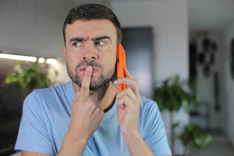 Man Getting a Suspicious Phone Call Stock Photo - Image of anonymous ...