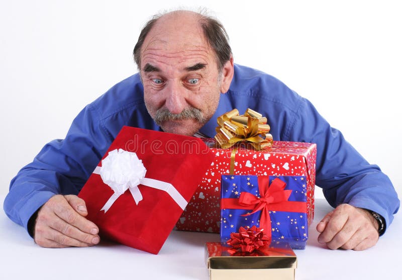 Greedy man with gifts stock image. Image of paper, retired - 3530597