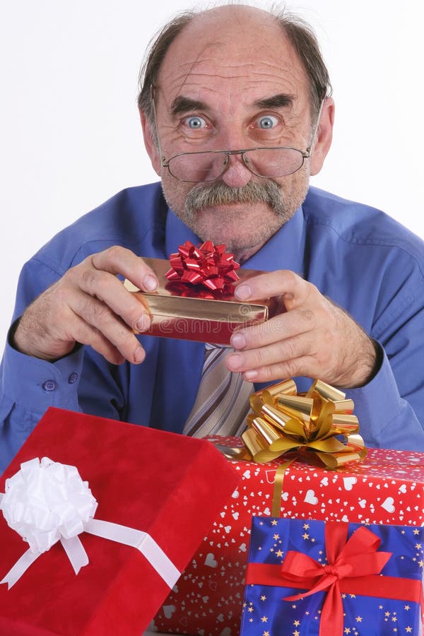 Greedy man with gifts stock image. Image of paper, retired - 3530597