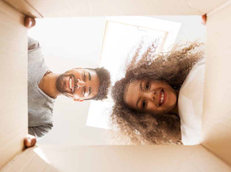 Man and a Girl Looking into a Box Stock Image - Image of open, looking ...