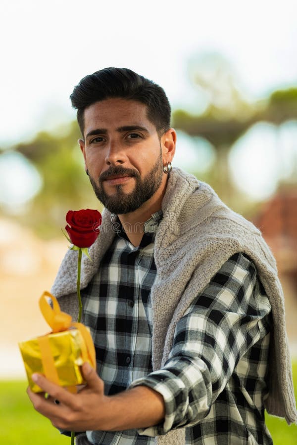A man gives a red rose stock image. Image of girl, feelings - 165404343