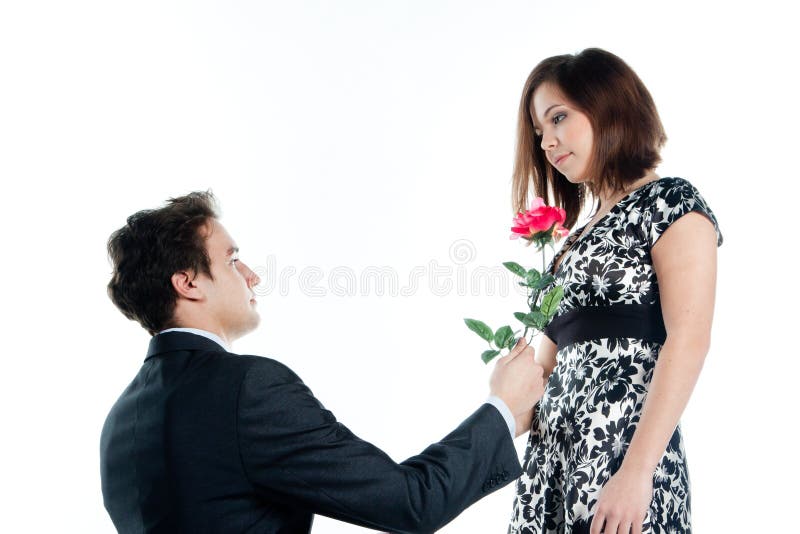 Man gives a woman flowers stock image. Image of give - 23216145