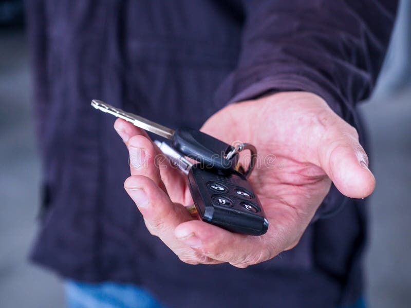 Man giving a car key stock photo. Image of driving, holding - 143168552