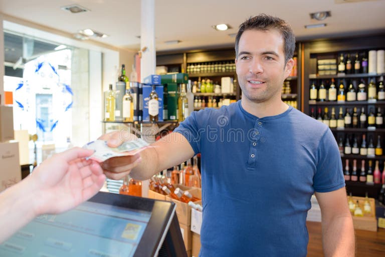 Man giving change stock image. Image of bottle, profit - 302960887