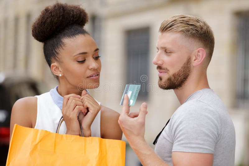 Man Giving Credit Card To Girlfriend Stock Image - Image of joyful ...
