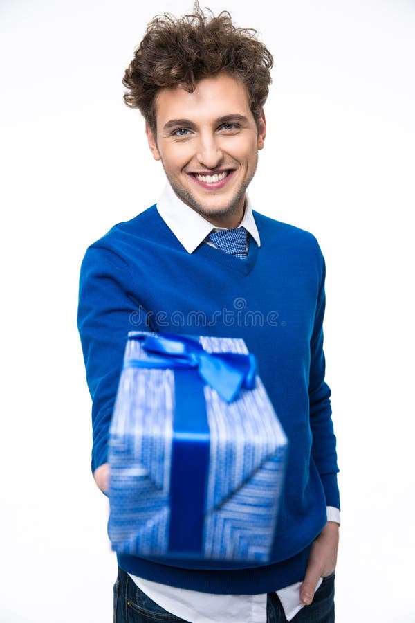 Man giving gift at camera stock image. Image of giving - 51152261