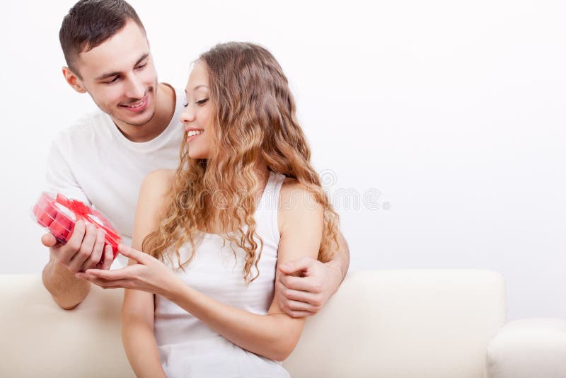 Man Giving Heart-shaped Box for His Girlfriend Stock Photo - Image of ...