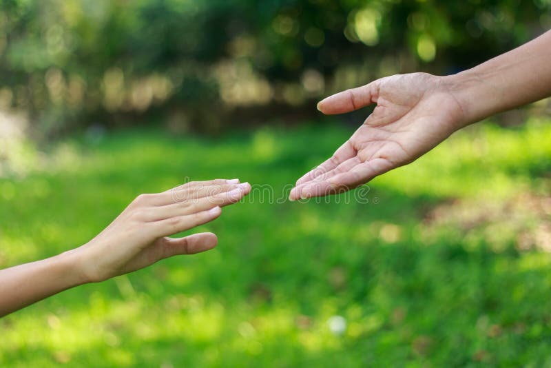 Helping hand to another stock photo. Image of child, friend - 39286134