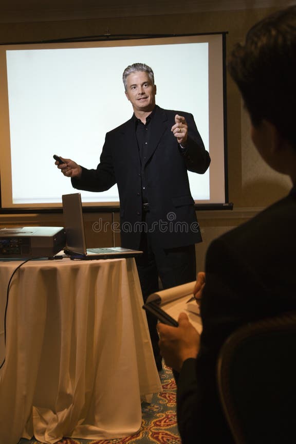 Man giving presentation. stock image. Image of laptop - 2044763