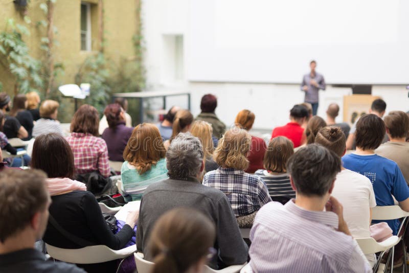 Man Giving Presentation in Lecture Hall at University. Editorial ...