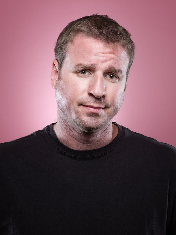 Man giving a serious look stock image. Image of pink - 21865013