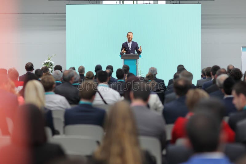 Man Giving a Speech on a Podium in Front of an Audience Stock Image ...