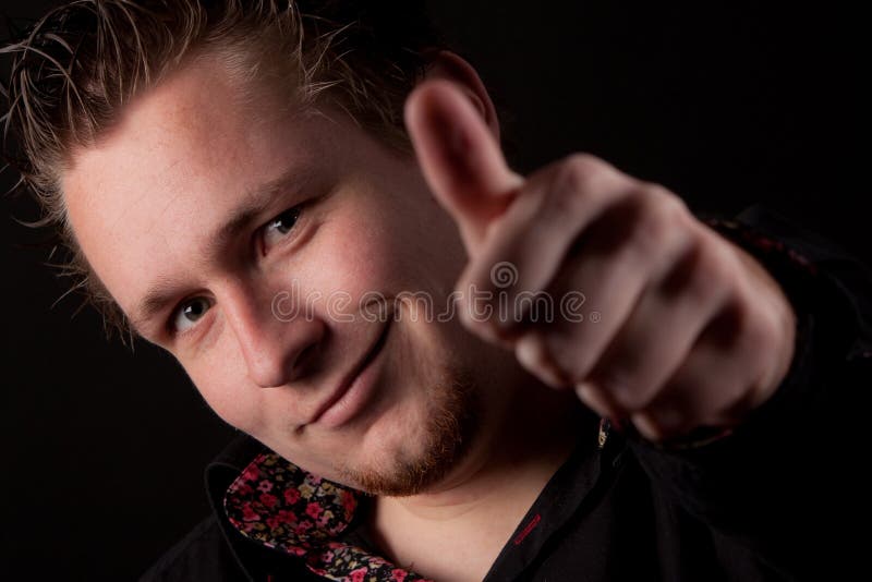 Man Giving the Thumbs Up Signal Stock Photo - Image of young ...