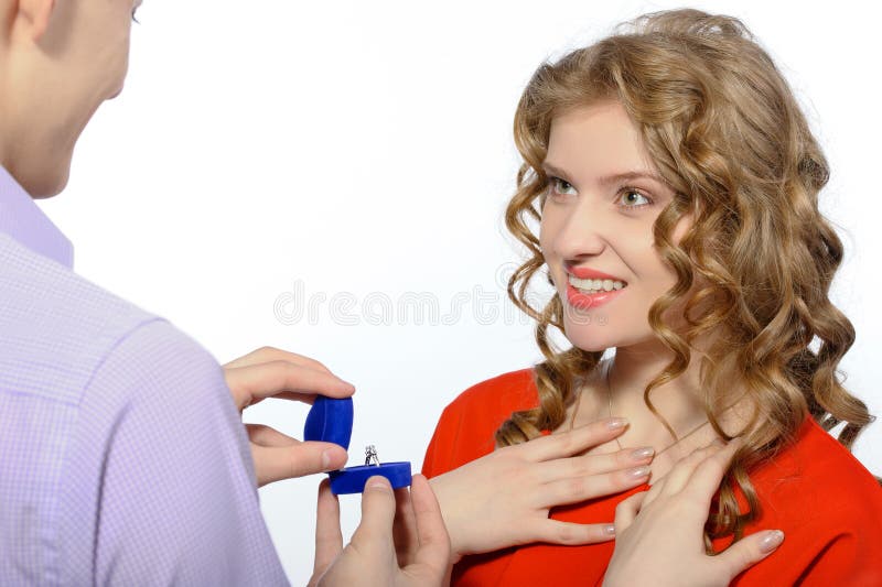 Man Giving a Woman an Engagement Ring Stock Image - Image of female ...