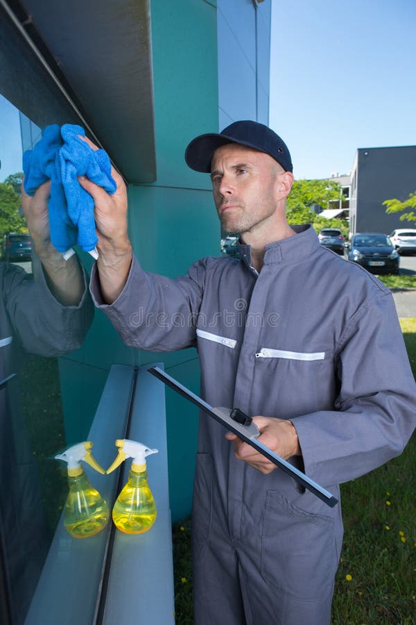 Man glass cleaning stock image. Image of housewife, bright - 259235851