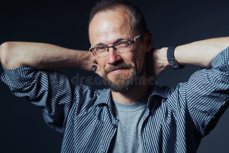 Man in Glasses Looking at Camera with Mistrust Expression Stock Photo ...
