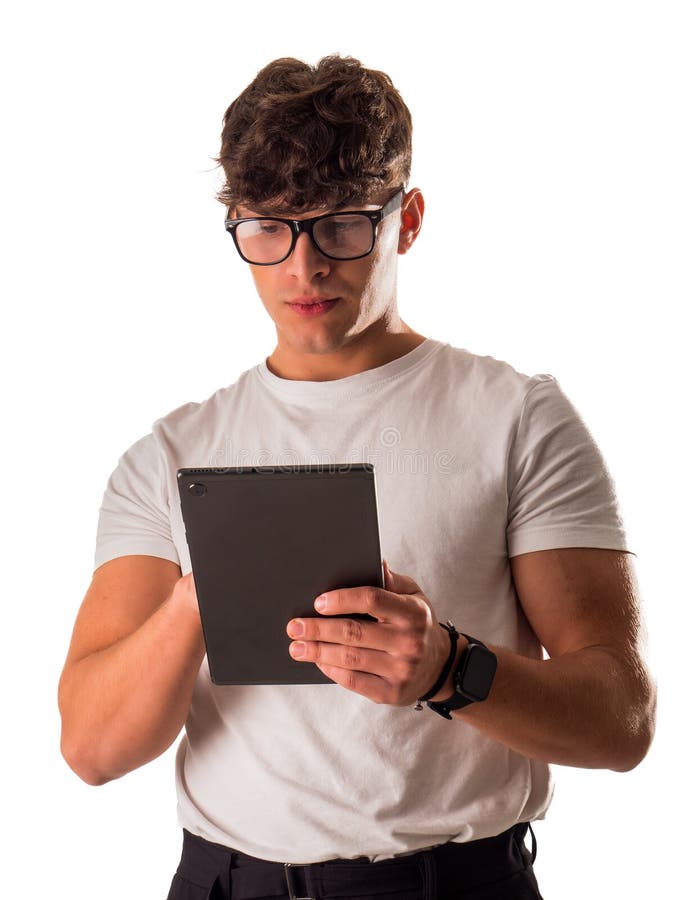 The Curious Technophile: a Man in Glasses Engrossed in His Tablet Stock ...
