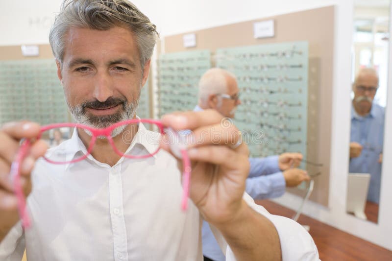 Man with Glasses at Optics Store Stock Photo - Image of care, gesture ...