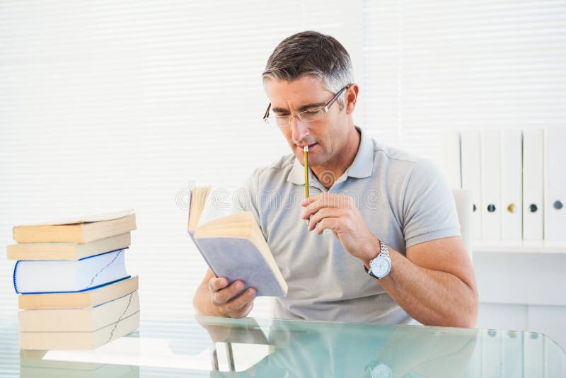 Thinking while reading stock photo. Image of reads, learning - 23515454