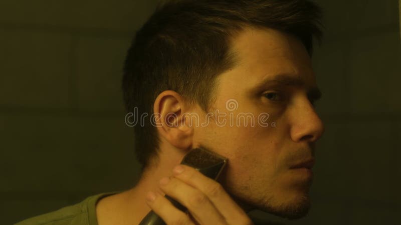Man Glides Electric Razor Across Face during Morning Routine Stock ...