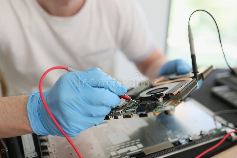 Man in Gloves Checkups Computer Motherboard at Workplace Stock Image ...