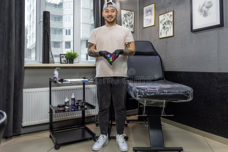 Man in Gloves Holding Tattoo Ink Stock Image - Image of wellbeing ...