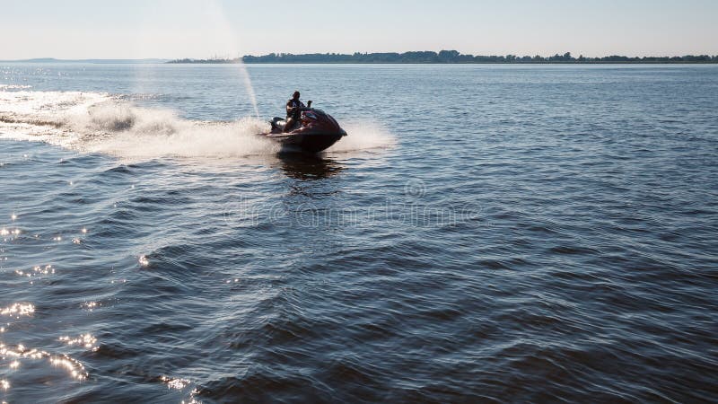 The Man Goes for a Drive on a Water Motorcycle Stock Photo - Image of ...