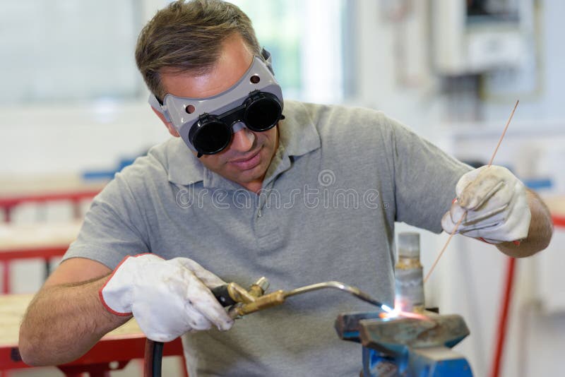 Man with Goggles in Workplace Stock Photo - Image of face, work: 231888350