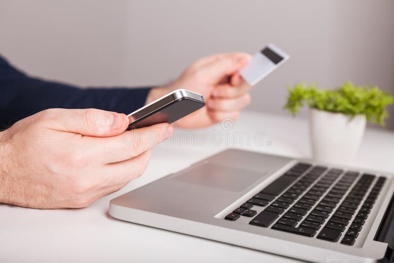A Man is Going To Pay for the Goods in the Internet Using Credit Stock ...