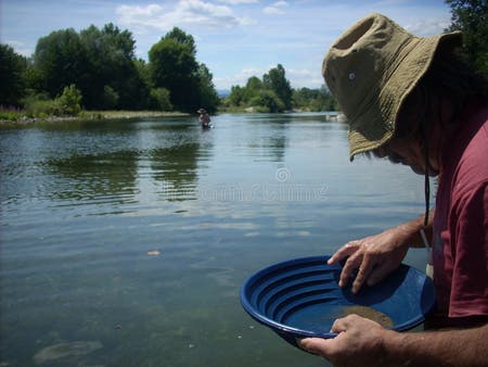 Man gold panning editorial stock image. Image of water - 31485299