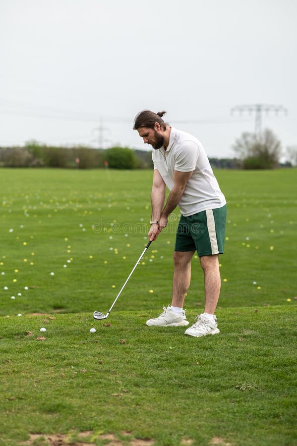 Man with Golf Ball on Lawn for Game Enjoying Match and Competition on ...