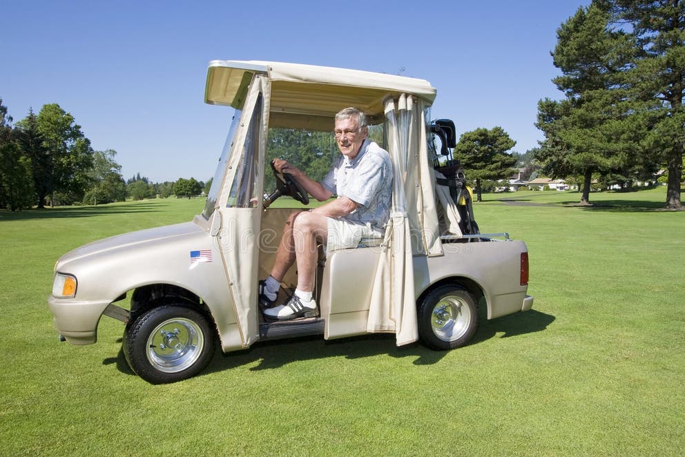 Man on a Golf Cart stock image. Image of chip, holidays - 6125853