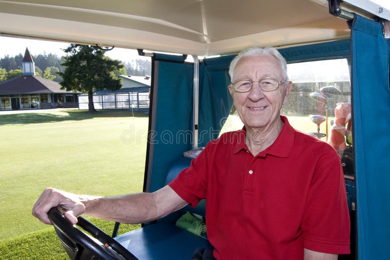 Man in Golf Cart Smiling stock image. Image of happiness - 6077707
