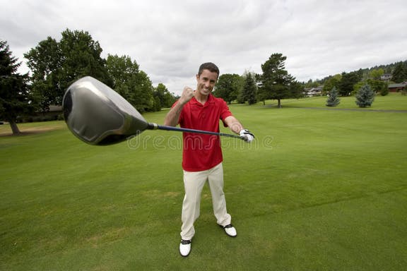 Man with Golf Club - Horizontal Stock Photo - Image of putt, golf: 6120930