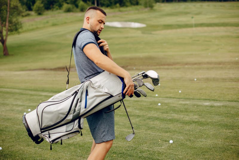 Handsome Man Playing Golf on a Golf Course Stock Image - Image of ...