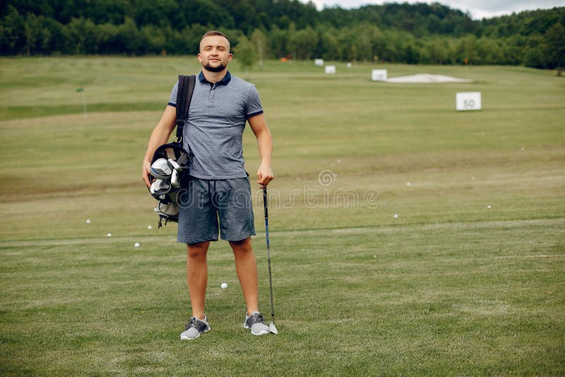 Handsome Man Playing Golf on a Golf Course Stock Photo - Image of ...