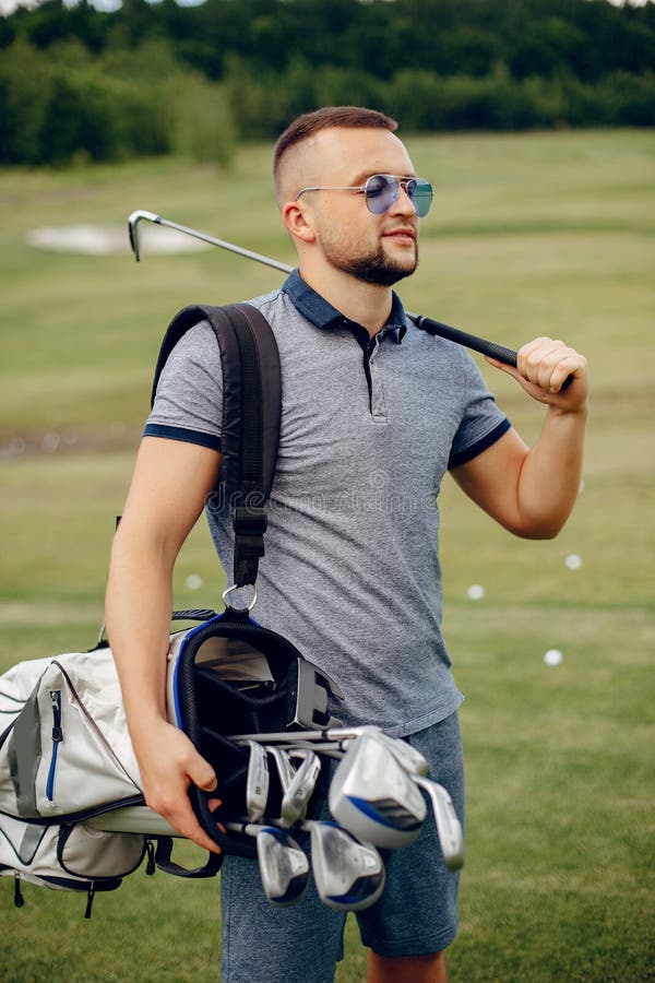 Handsome Man Playing Golf on a Golf Course Stock Image - Image of grass ...