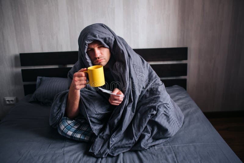 The Man Got Sick Lies In Bed And Suffers He Has Fever Flu Colds And