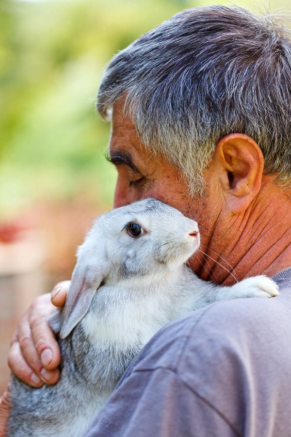 17+ Man holding rabbit Free Stock Photos - StockFreeImages