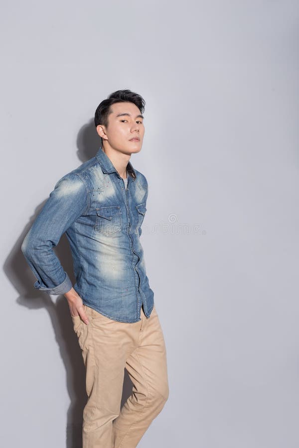 Man with gray wall stock image. Image of face, copy, watch - 86875239