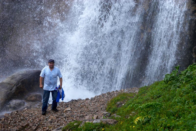 Man and great waterfall stock image. Image of calm, adventure - 3255369
