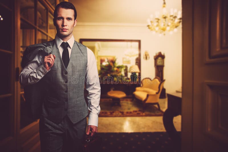 Man indoors stock image. Image of lamp, people, hotel - 30000991