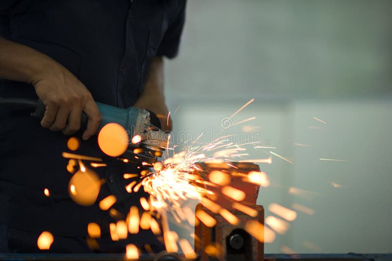 Man grinding steel stock photo. Image of industrial, electric - 74083526