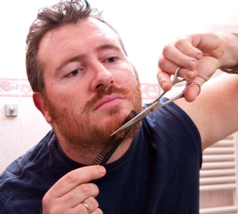 Man Grooming His Beard with Scissors Stock Photo - Image of handsome ...